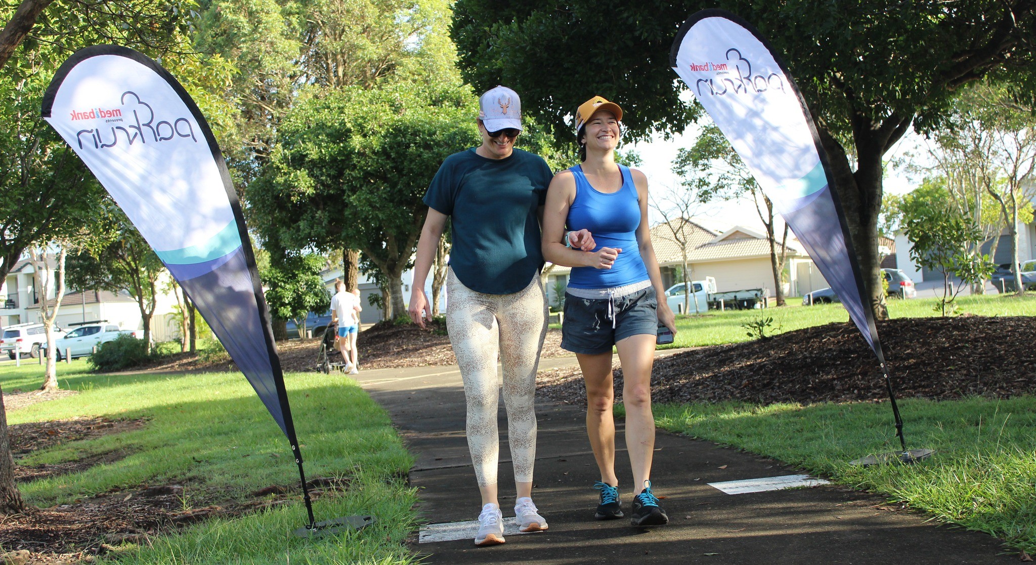 Alexiah picking-up parkrun photography | parkrun AU Blog