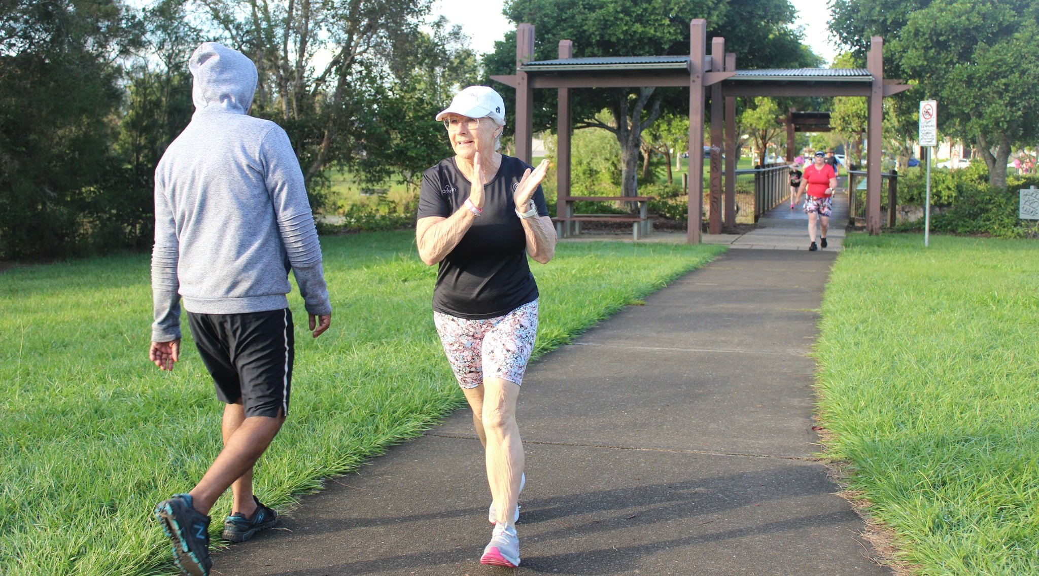 Alexiah picking-up parkrun photography | parkrun AU Blog