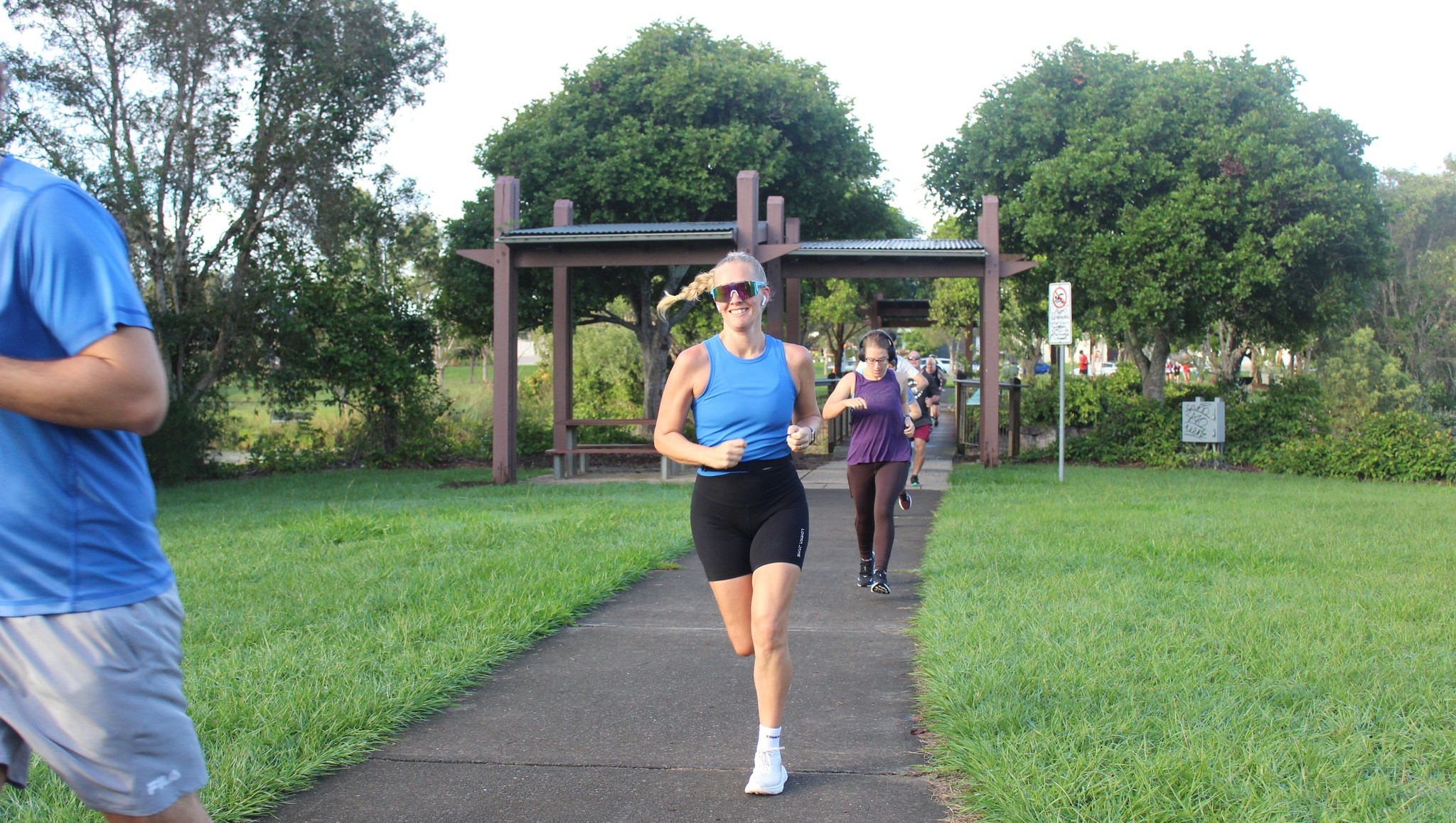 Alexiah picking-up parkrun photography | parkrun AU Blog
