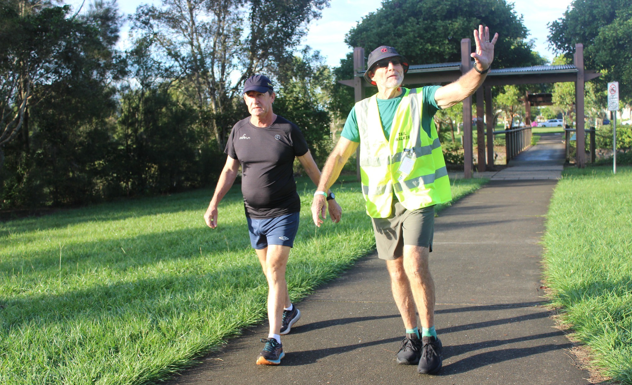 Alexiah picking-up parkrun photography | parkrun AU Blog