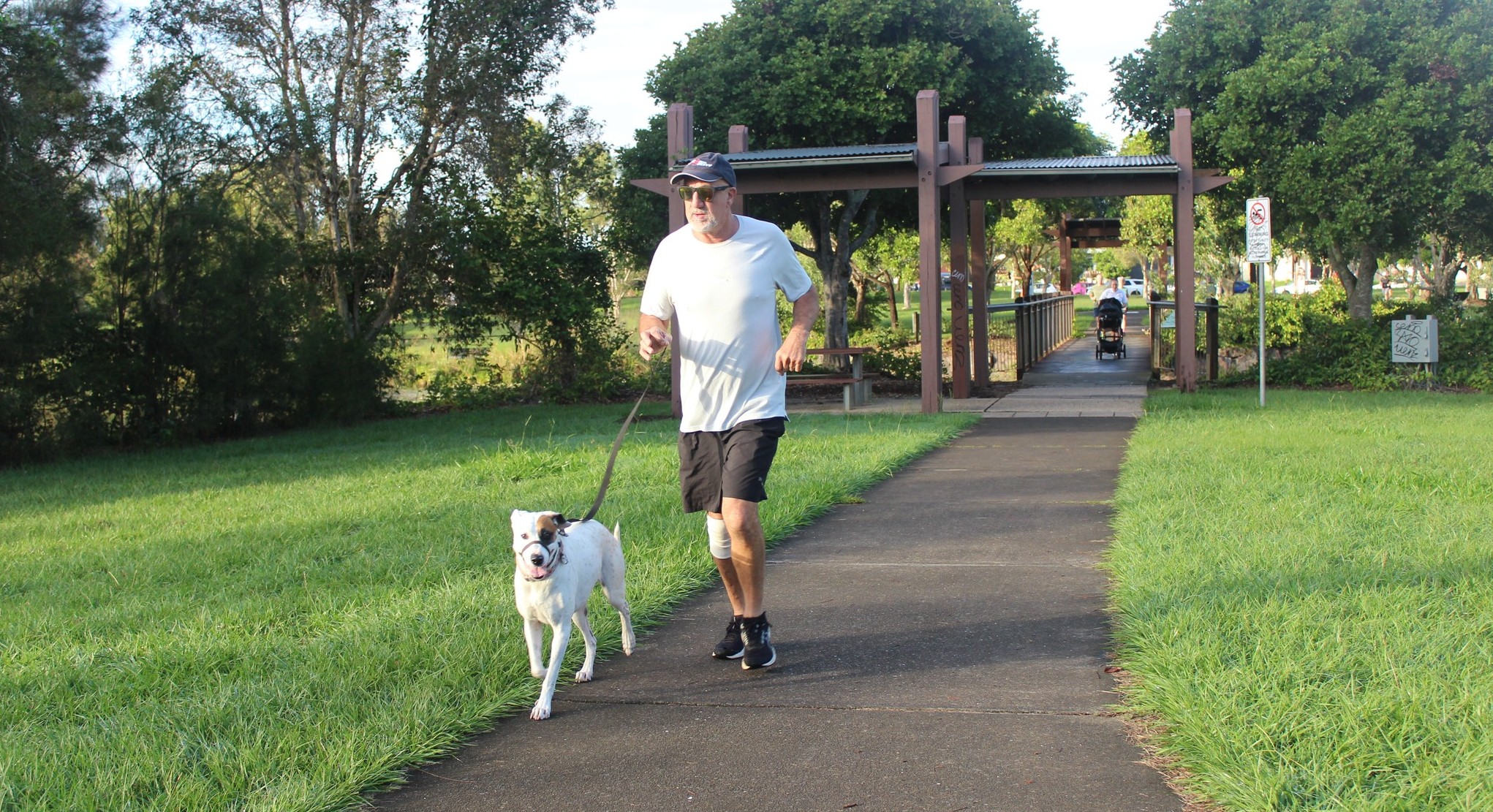 Alexiah picking-up parkrun photography | parkrun AU Blog