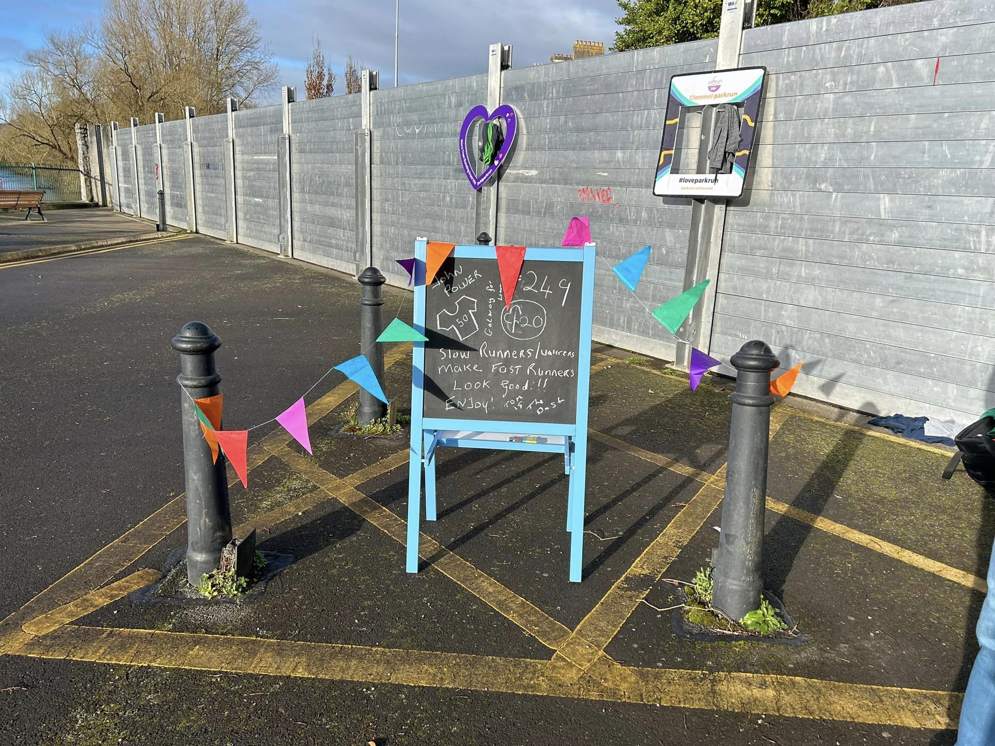 The welcoming of the chalk board! | Clonmel parkrun